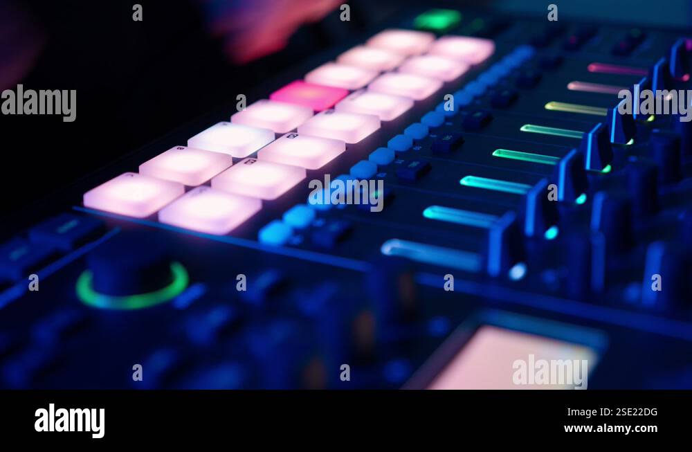 Professional DJ Plays Beat Sampler with Color Drum Pads and Samples in ...