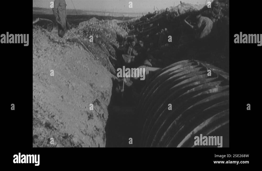 1910s: People with shovels, tools digging trench for bunker. Bunker ...