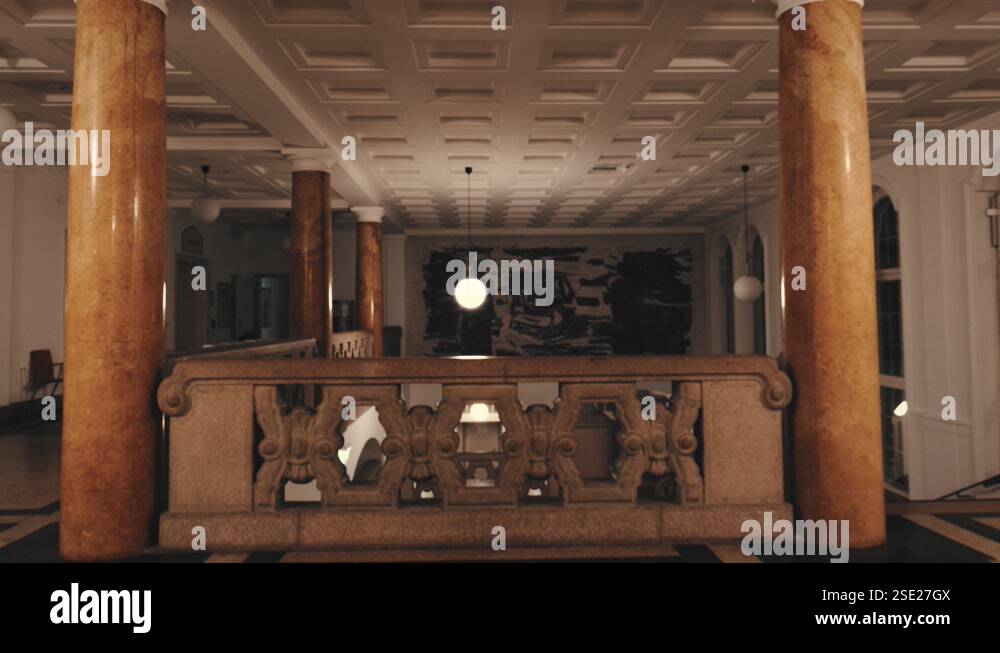 A historic hall with pillars on the side and stairs in front, build in ...