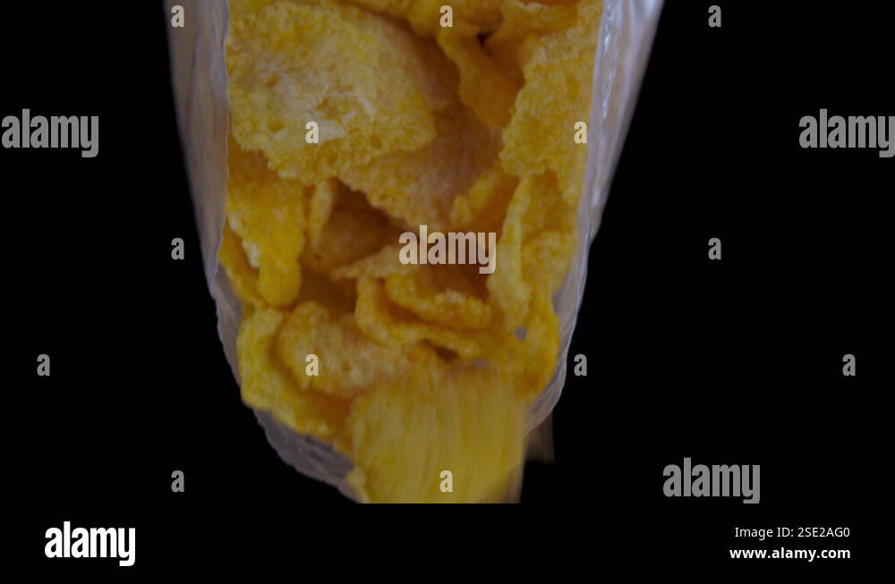 pouring breakfast corn flakes cereals from plastic bag 4k Stock Video ...