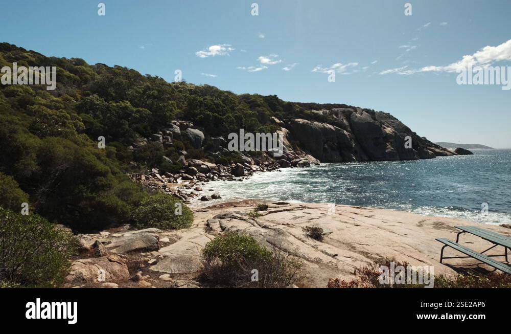 Dolly forward in the scenic isolated coastline of Woody Island, Western ...