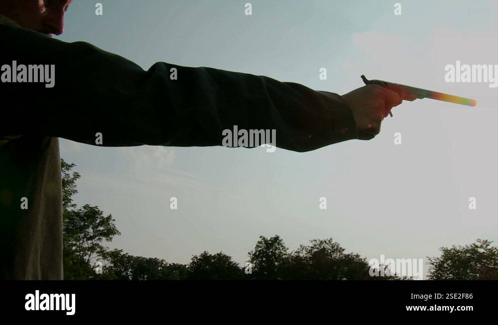 Man Firing a 19th century Black Powder Revolver - Old Western style ...
