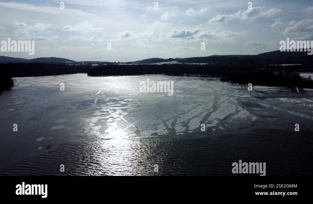 Flight over an icy lake in winter - beautiful winter landscape Stock ...