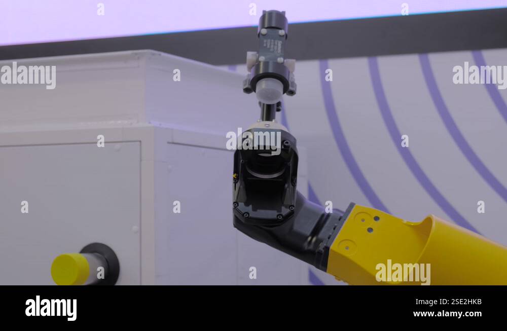 Robotic arm manipulator with paint spray head demonstrates working ...