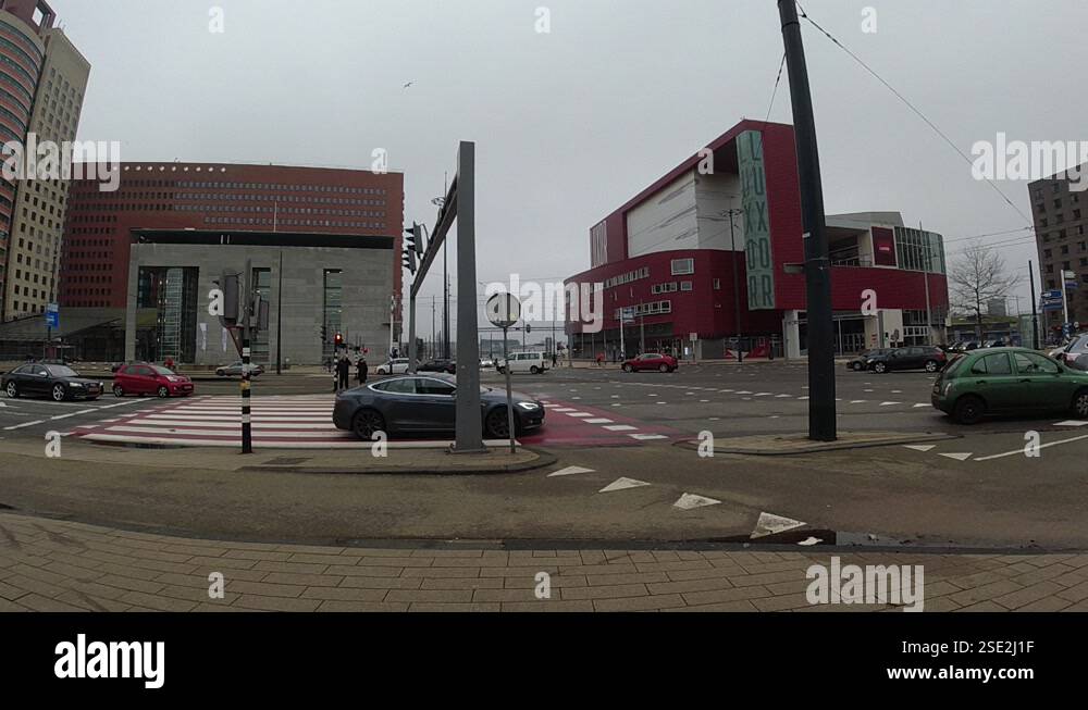 Tesla car driving in Rotterdam, KPN, de Rotterdam, Erasmusbrug, Kop van ...