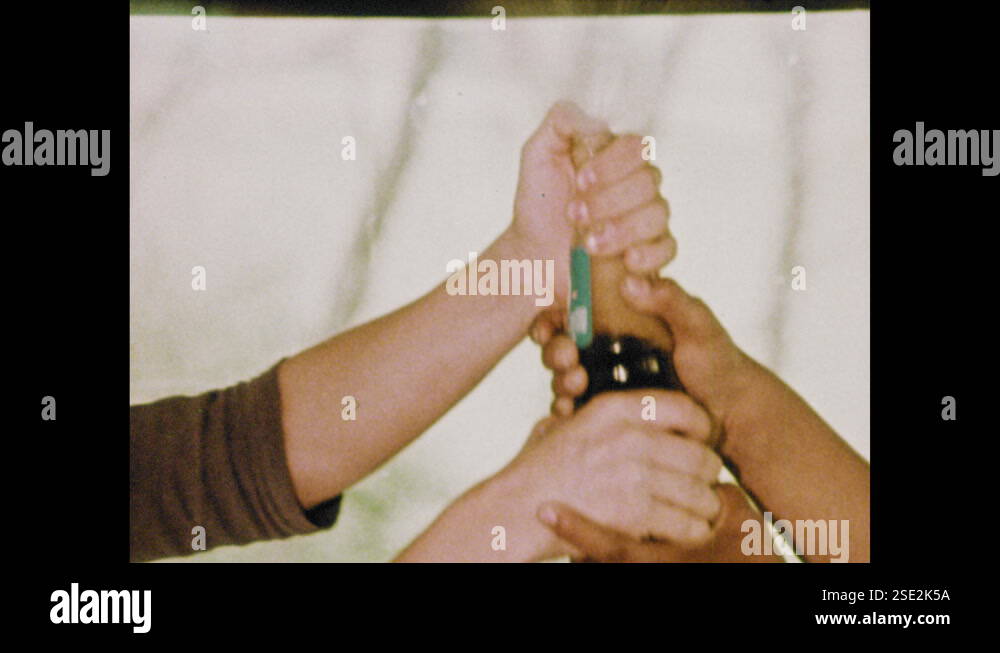 1970s: Boys fight over soda bottle. Soda sprays on Mona Lisa painting ...