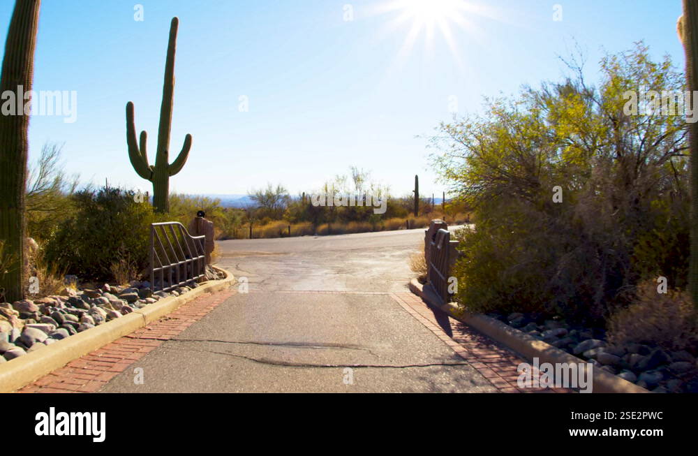 Driving on a private driveway in desert community in Arizona Stock ...