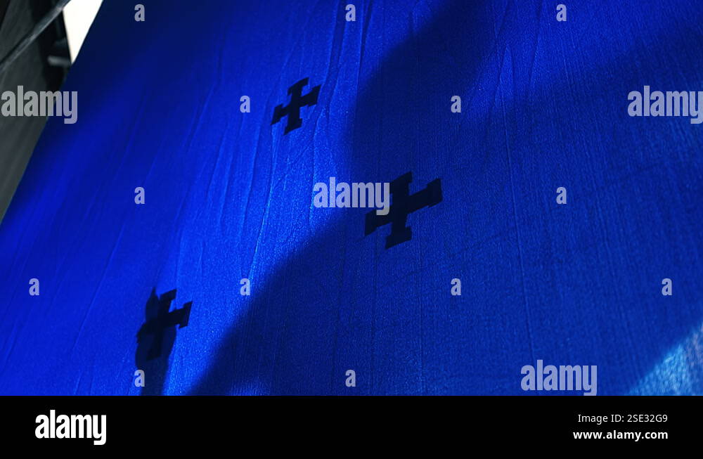 Red tracking markers on a chromakey with a man's shadow in a pose on it ...