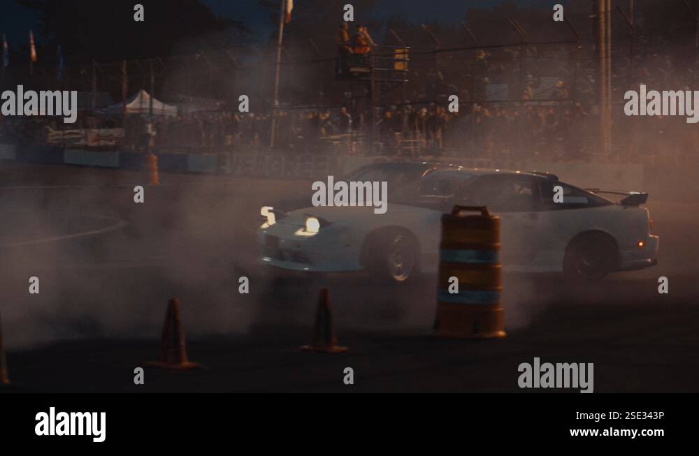 Three Modified Cars Drifting Around the Driftcon Race Track at Night ...
