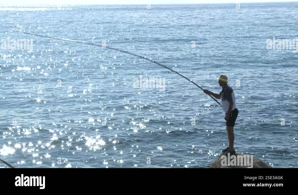 Fishermen catch fish off the coast of Beirut Stock Video Footage - Alamy