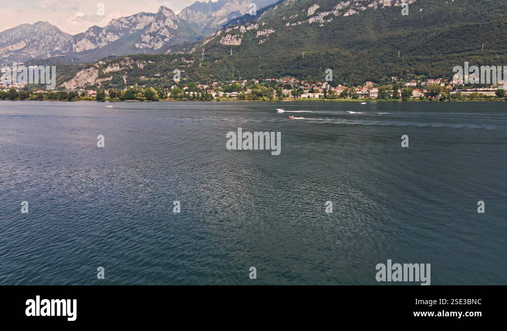Beautiful Lake Como With Boats Sailing During Sunny Day Of Summer In ...