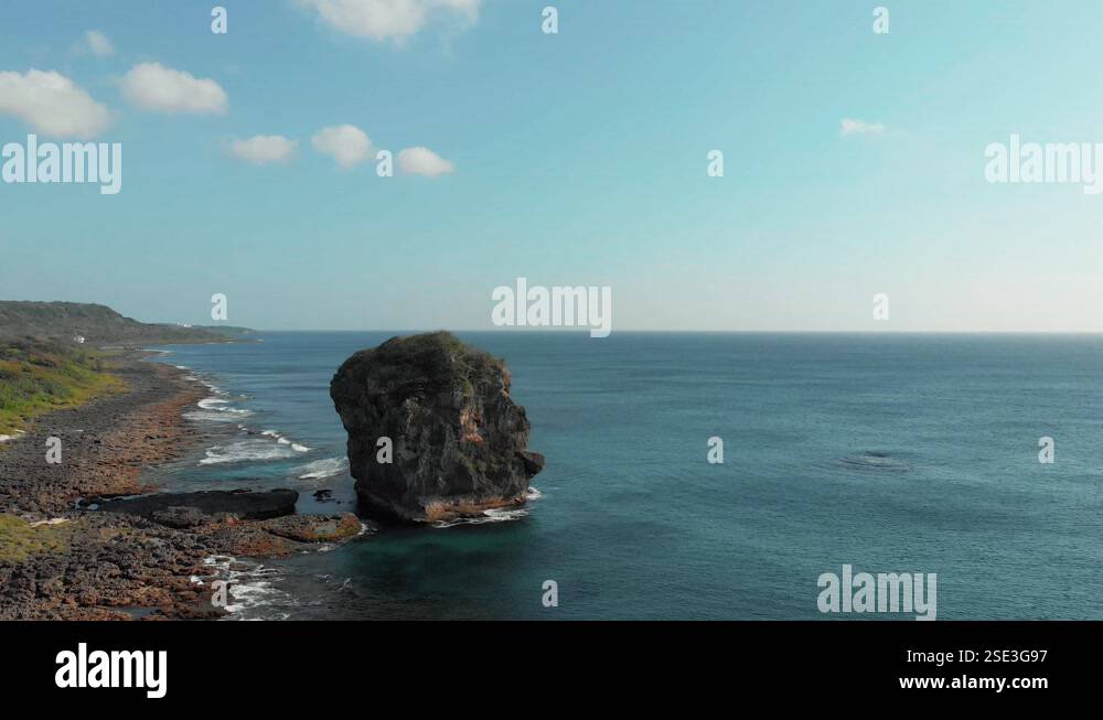 Sail Rock on coast of Kenting National Park, Taiwan. Aerial circling Stock Video Footage - Alamy