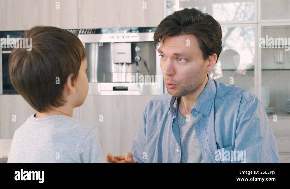 Father scolds his son for bad behavior Stock Video Footage - Alamy