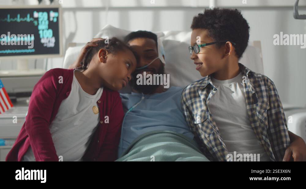 Happy afro-american children visiting father in hospital Stock Video ...