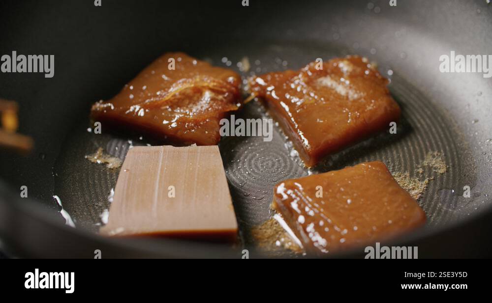Grill chinese sticky rice cake Stock Video Footage - Alamy