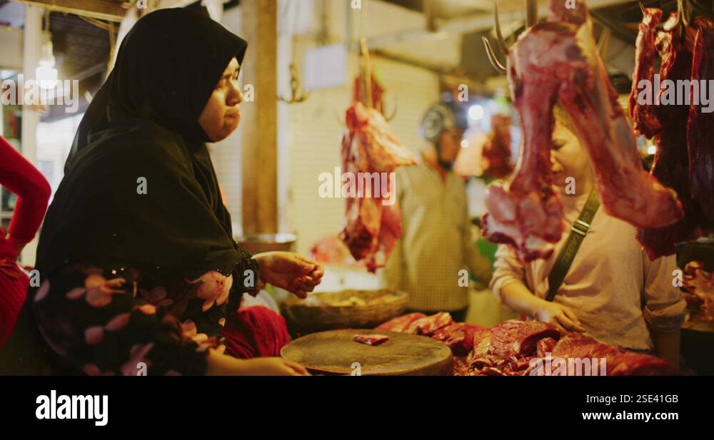 Muslim Female Butcher Cutting Beef at The Old Market in Siem Reap ...