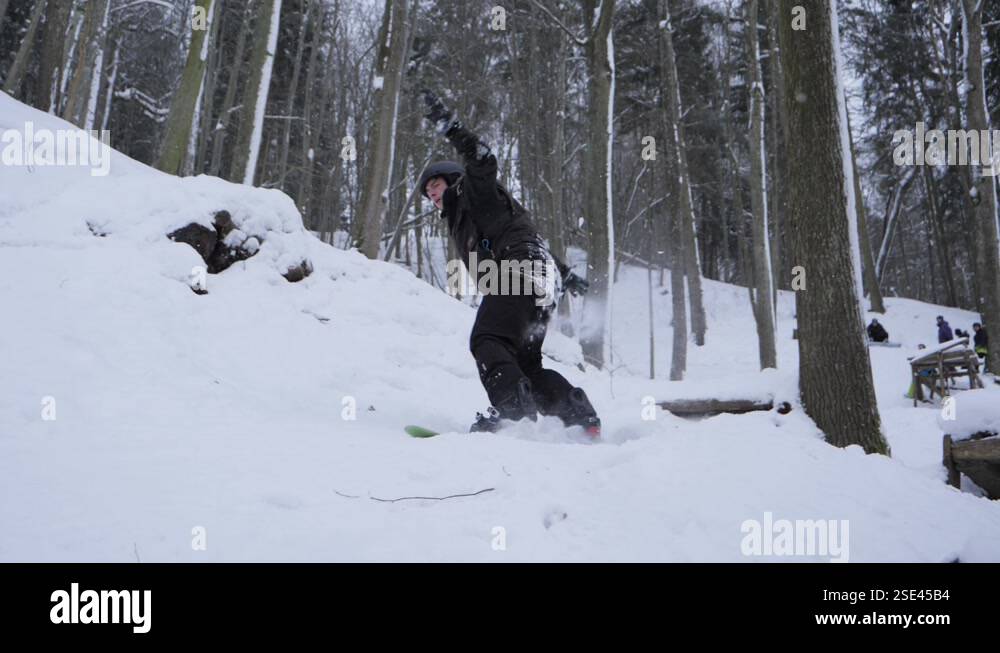 Snowboard fall after jump, slow motion Stock Video Footage - Alamy