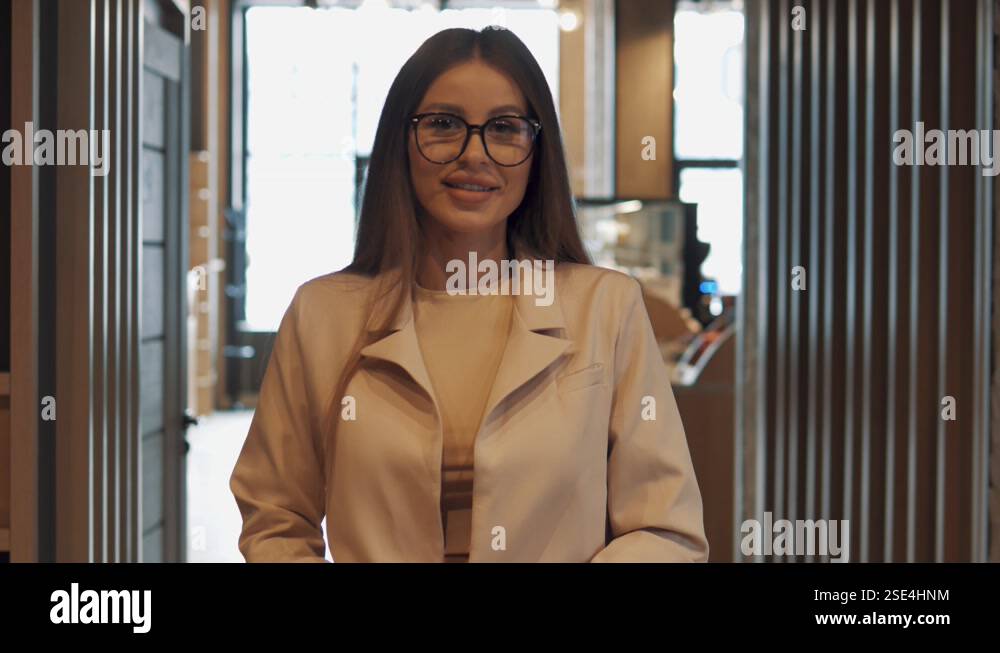 Portrait of confident pretty woman, business woman owner, girl waiter ...