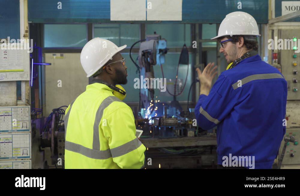 Western worker, caucasian and black african, engineer team control the ...