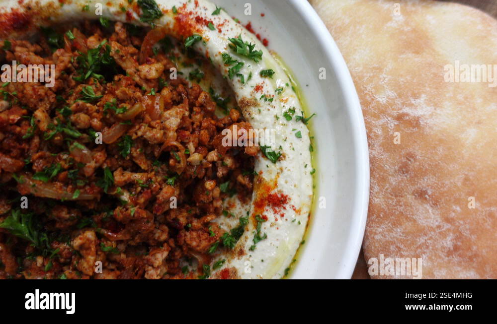 Mediterranean paprika meat and hummus with pita bread middle east ...