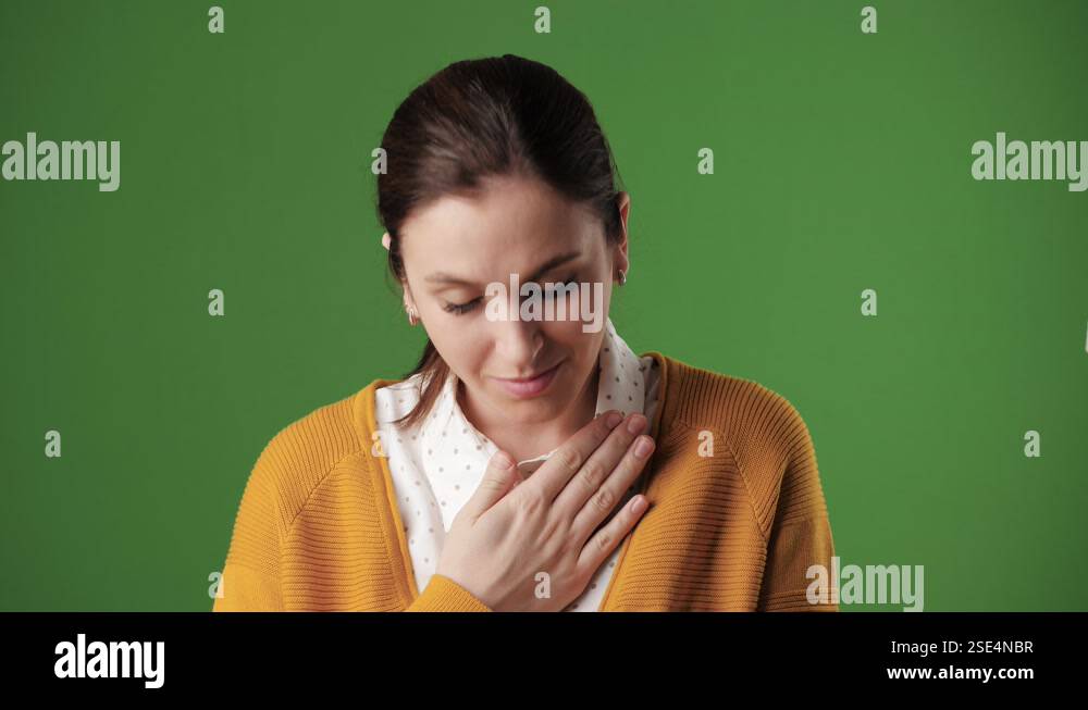 Respect bow. Woman on chroma key background green screen looking at ...