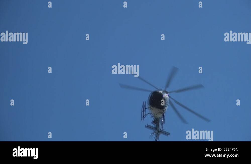 Police Helicopter flying overhead hd Stock Video Footage - Alamy