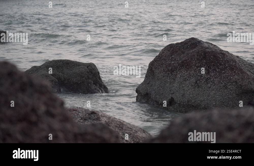 Big Rough Rocks With Calm Waves At Galgibaga Beach In South Goa, India ...