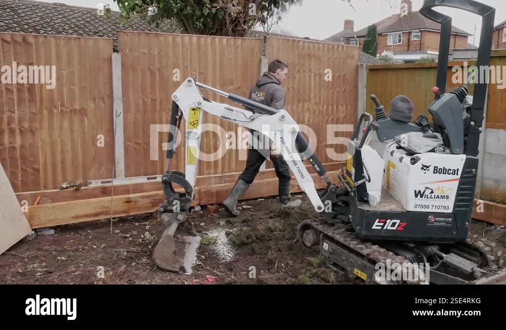 Man Using A Micro Digger, Landscape Gardening Project Stock Video ...