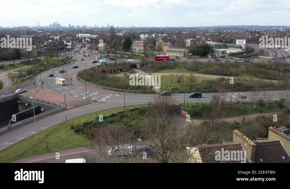 BUS ON BUSY CITY ROUNDABOUT, LONDON AERIAL Stock Video Footage - Alamy