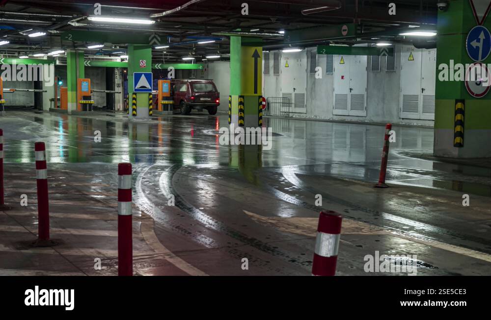 Entry and exit of cars from underground Parking lot of shopping mall ...