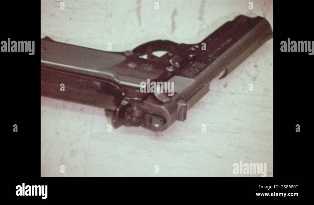 1970s: A semi-automatic gun on a linoleum floor. A crusty old revolver ...