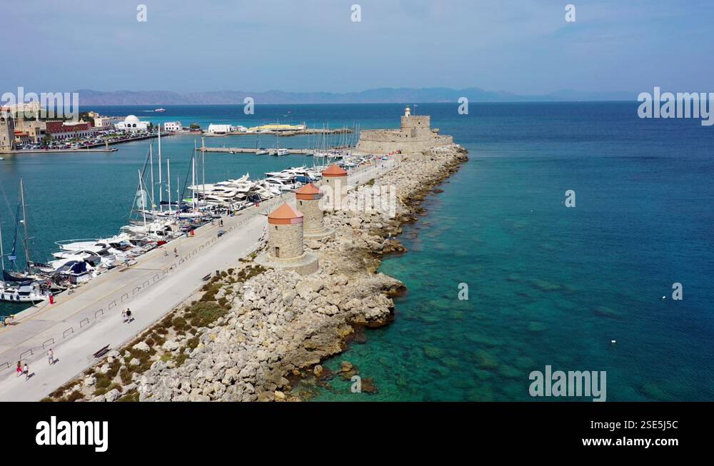 Mandraki port with deers statue, where The Colossus was standing and ...