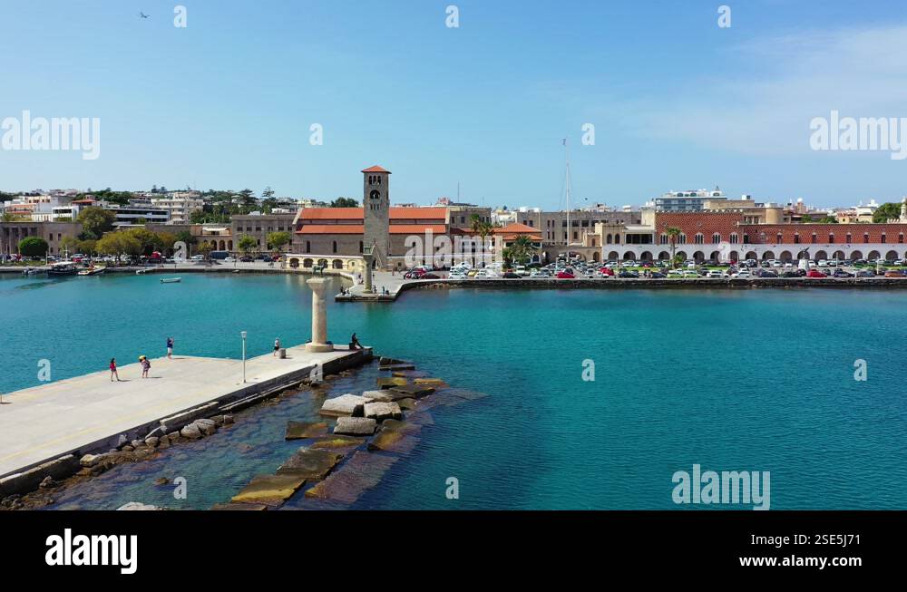 Mandraki port with deers statue, where The Colossus was standing and ...