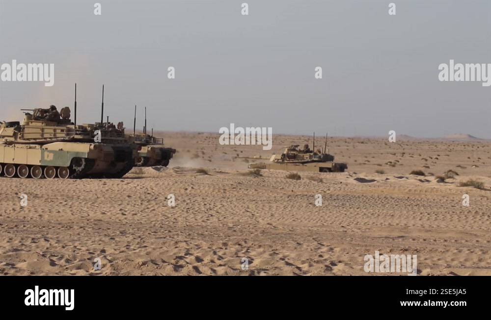 Battle tanks firing guns in desert during Iron Union in UAE Stock Video ...