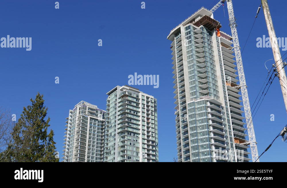 The motion of construction of a new high-rise building in a city with ...