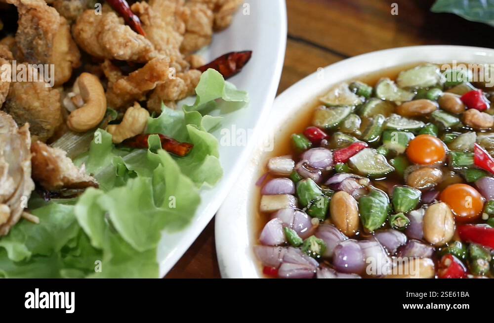 Close Up Footage of Thai Style Deep Fried Fish Served With Palm Sugar ...