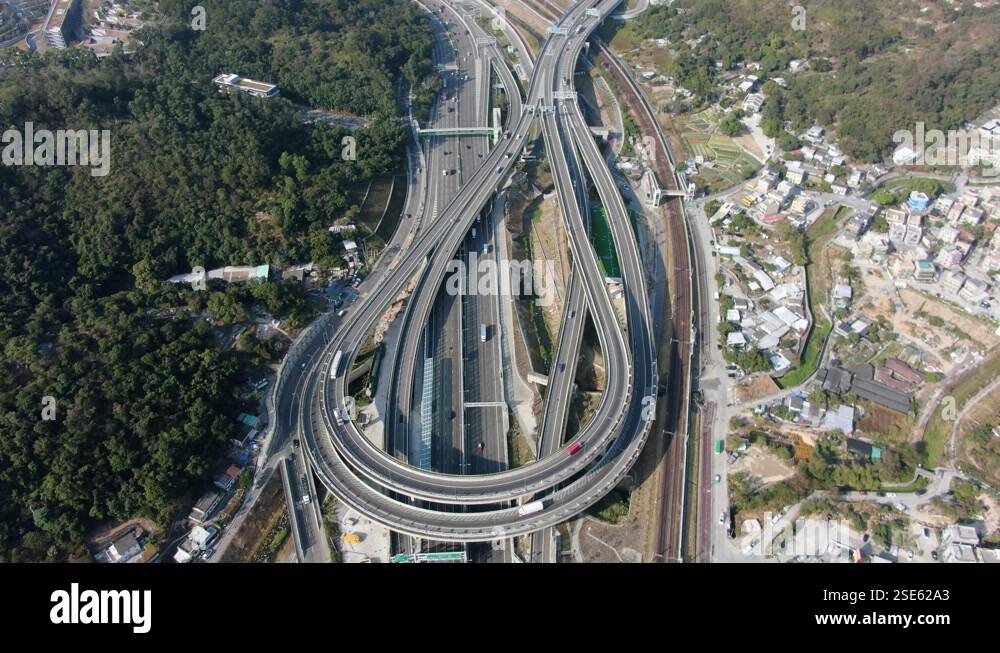 Traffic on a Massive highway interchange with multiple levels and loop ...