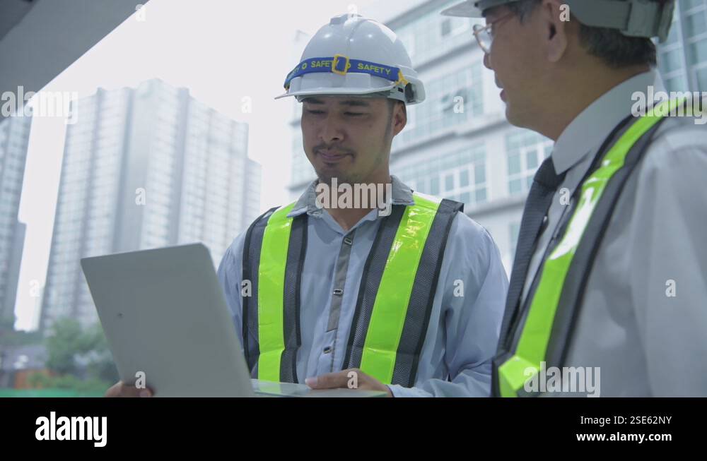 Engineer concept of 4k Resolution. Asian men are consulting using ...