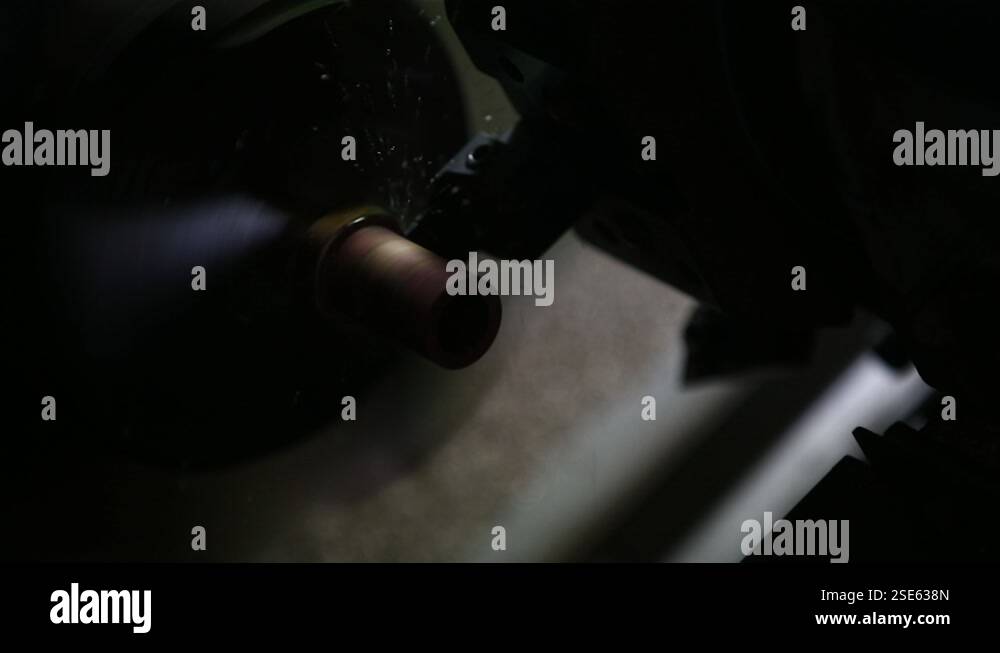 The operation of wire-EDM machine cutting the die insert parts. The ...