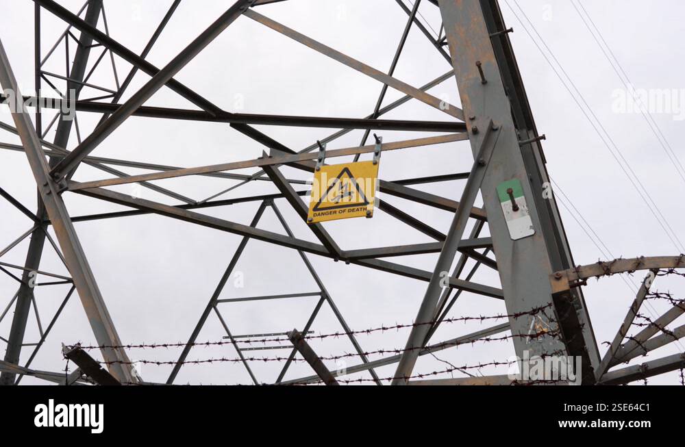 Electric tower with danger sign on. Climbing not allowed on Electric ...