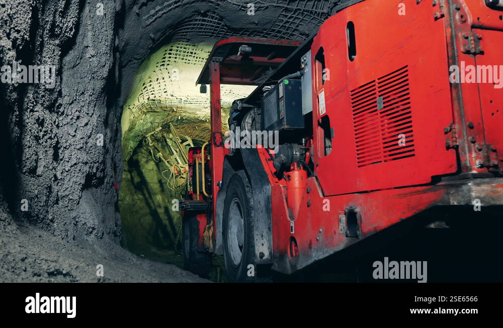 Massive boring machine working in the underground mine. Underground ...