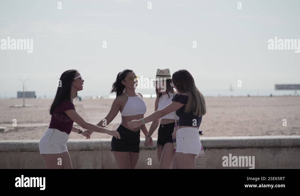 Four friends hugging Stock Videos & Footage - HD and 4K Video Clips - Alamy
