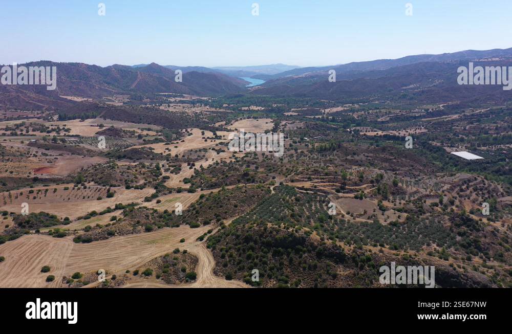 Small rural settlement among scrublands on hill slopes Stock Video ...