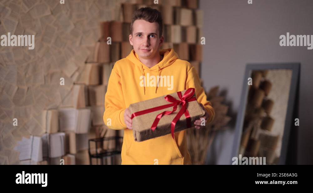 Man throwing box with gift, congratulate with birthday, slow motion 4k ...