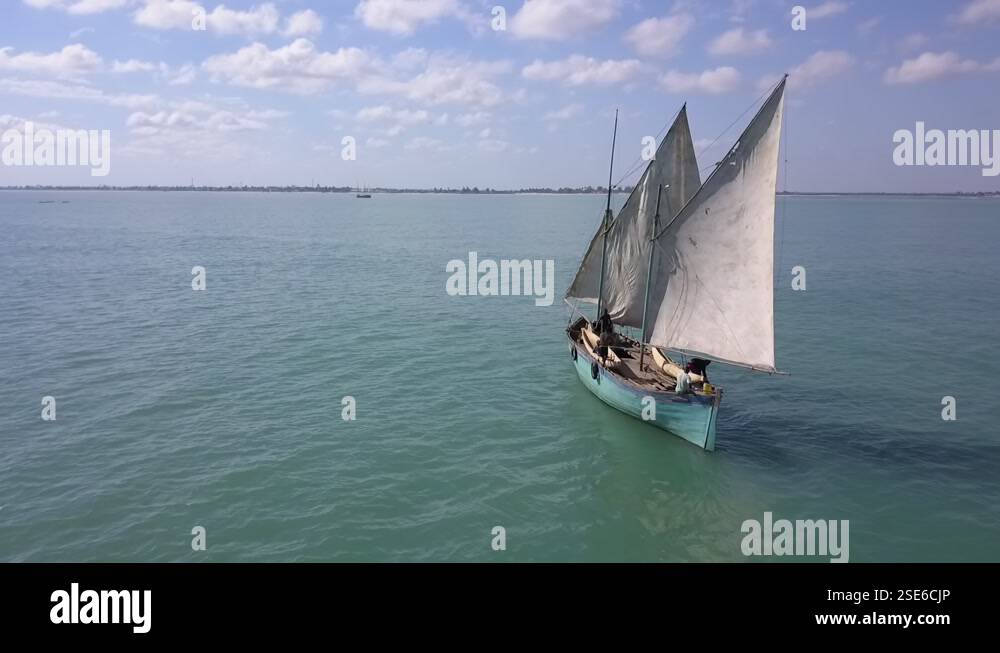 Traditional fishing sailboat out at sea near Morondava, Madagascar ...