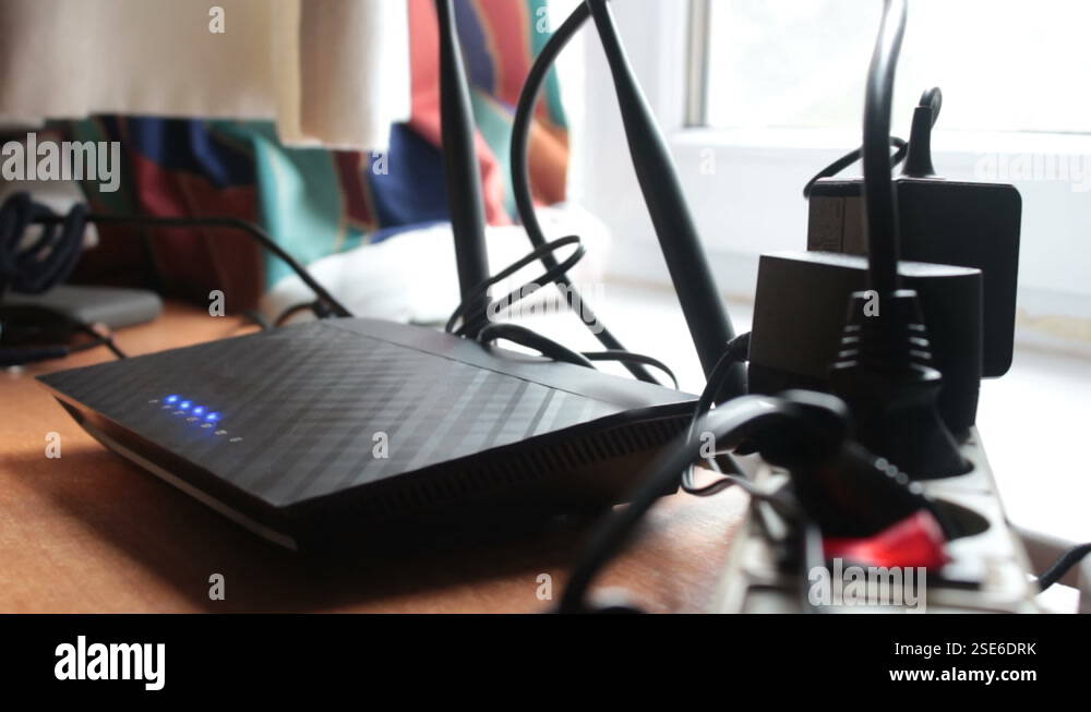 Blinking of the signal indicator on the Wi-Fi router. Wi-Fi router with ...