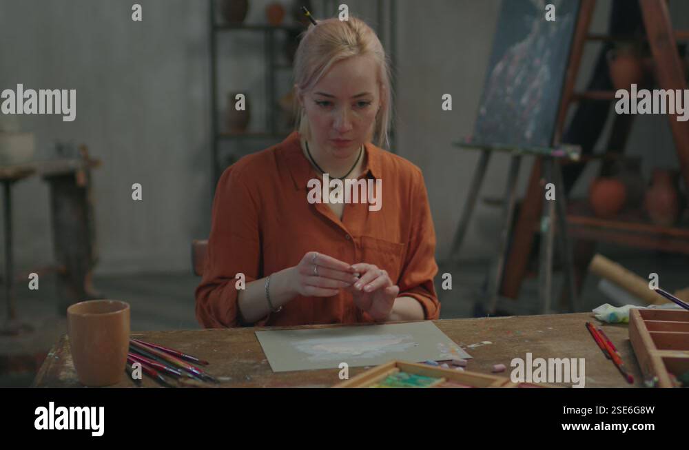 Portrait of woman painter drawing using pastel crayons Stock Video ...