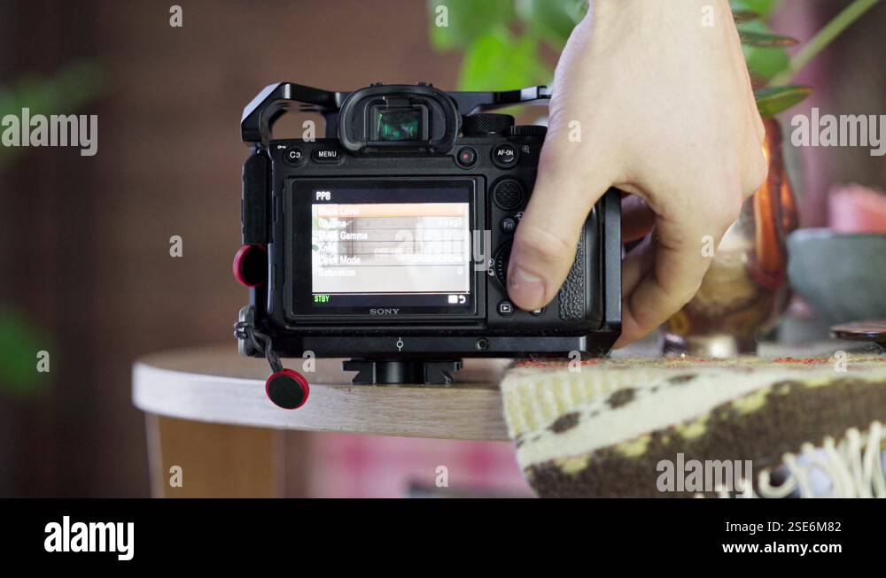 Adjusting camera settings for the perfect shot -close up Stock Video ...