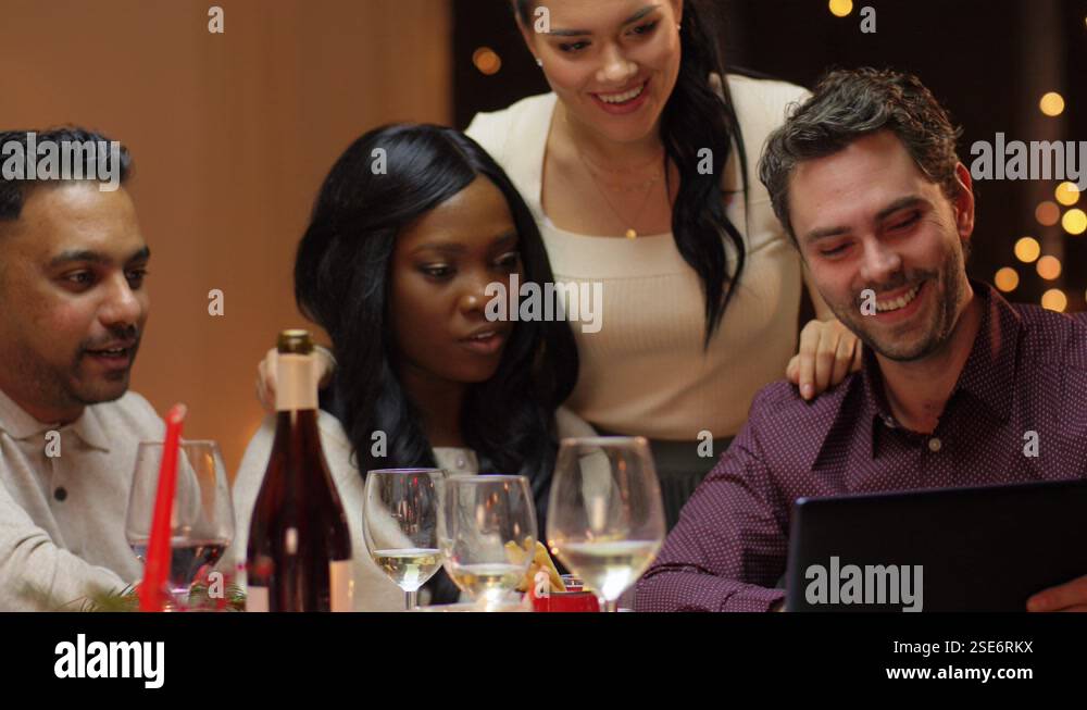 friends having video call at christmas dinner Stock Video Footage - Alamy