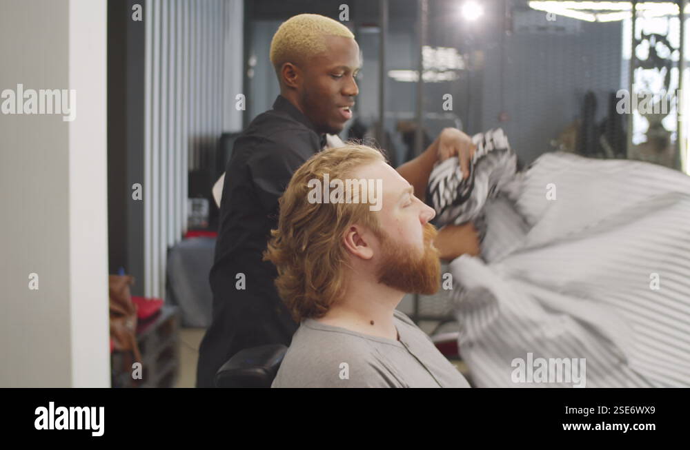 Positive Barber Speaking and Shaking Hands with Male Client Stock Video ...